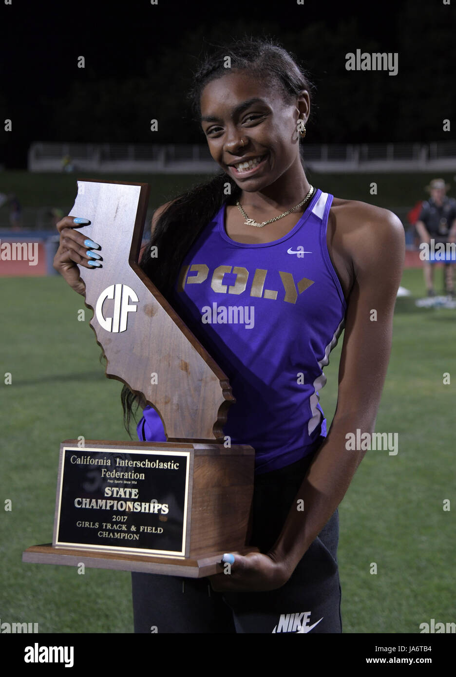 Zhane Smith of Long Beach Poly poses with the girls team championship ...