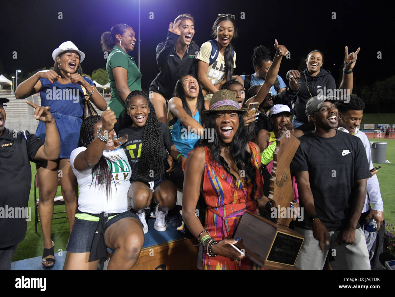 Members of the Long Beach Poly Jackrabbits coach Cryrstal Irving ...