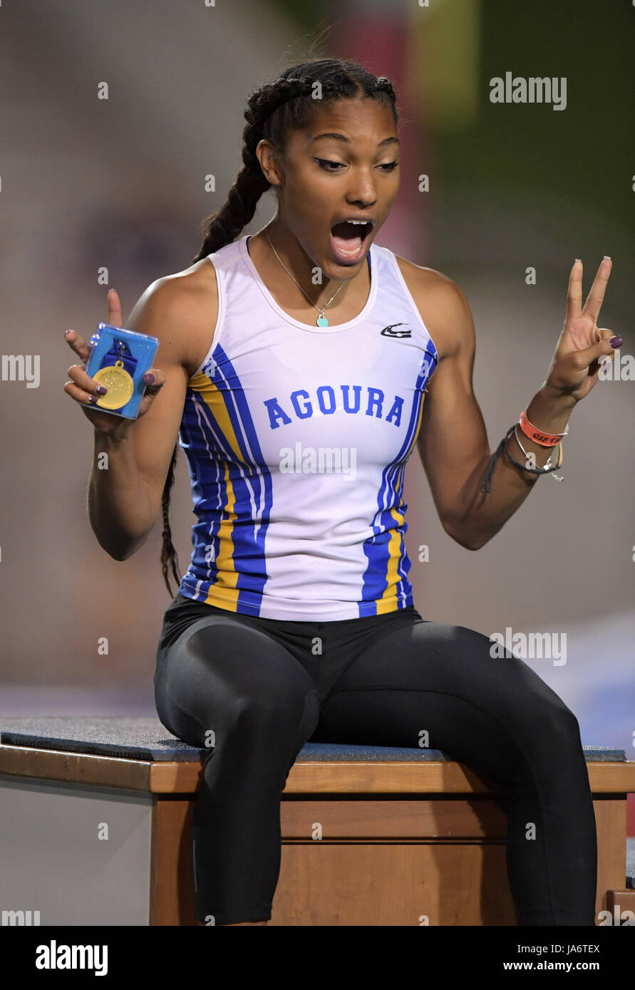 Tara Davis of Agoura poses after winning the girls 100m hurdles, long ...