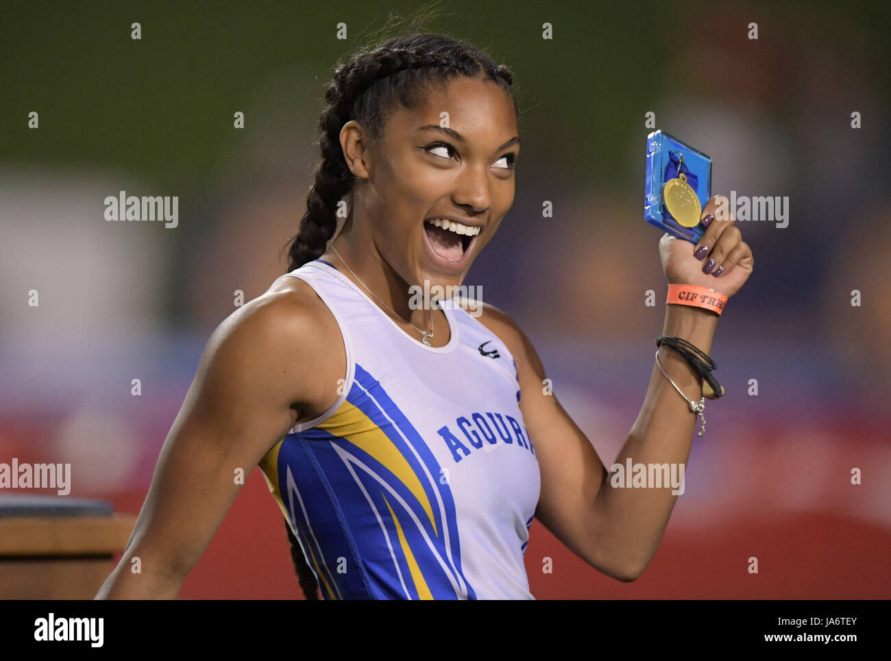 Tara Davis of Agoura poses after winning the girls 100m hurdles, long ...
