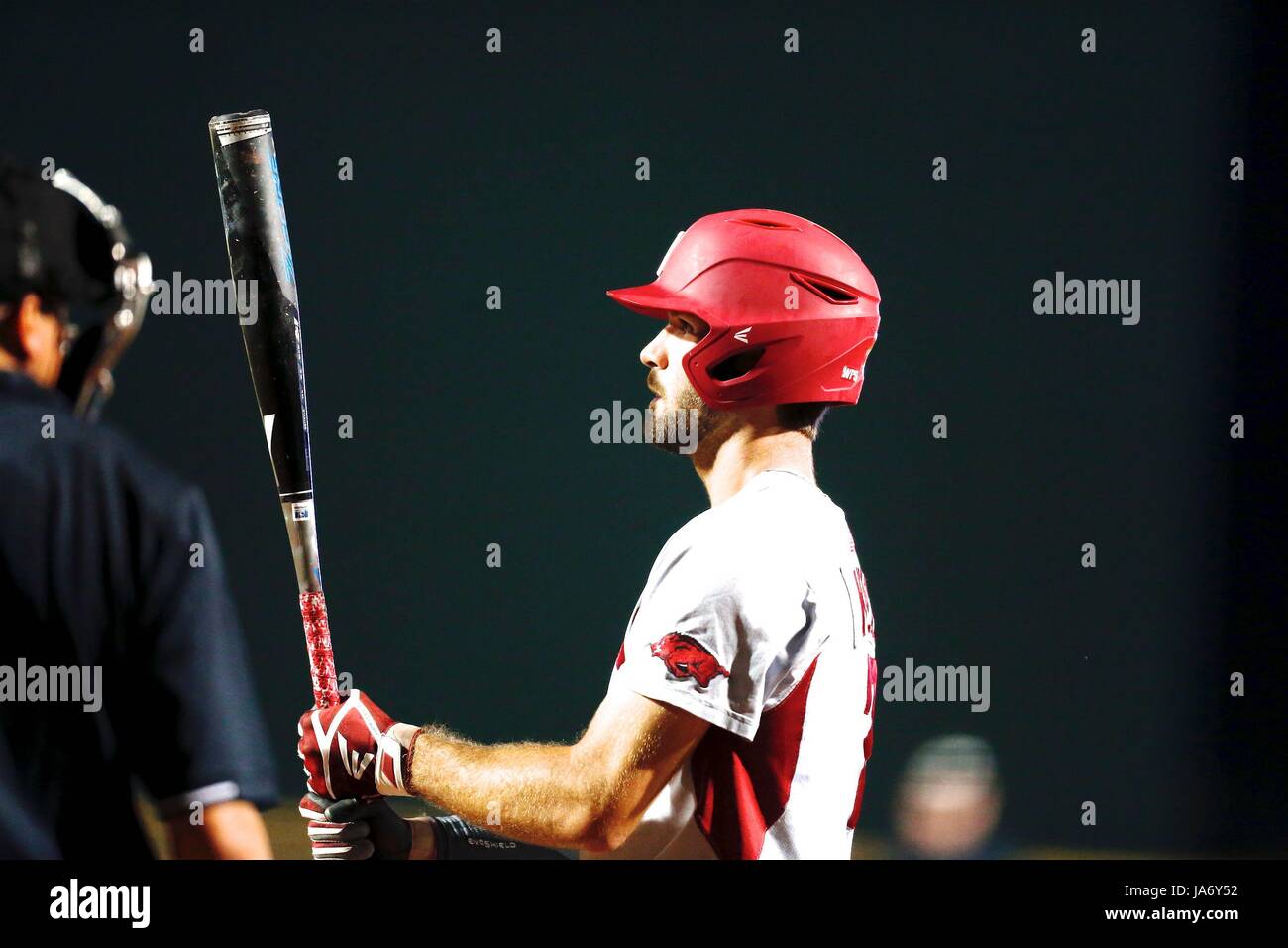 Jun 3, 2017: Arkansas third baseman Jack Kenley #7 looks over his bat ...