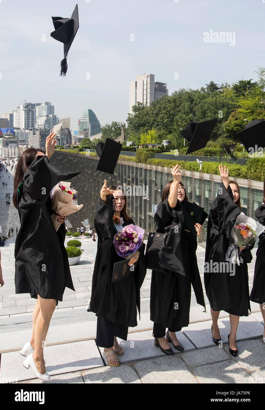 Graduation ceremony Students of Ewha Womans University in Seoul pose ...