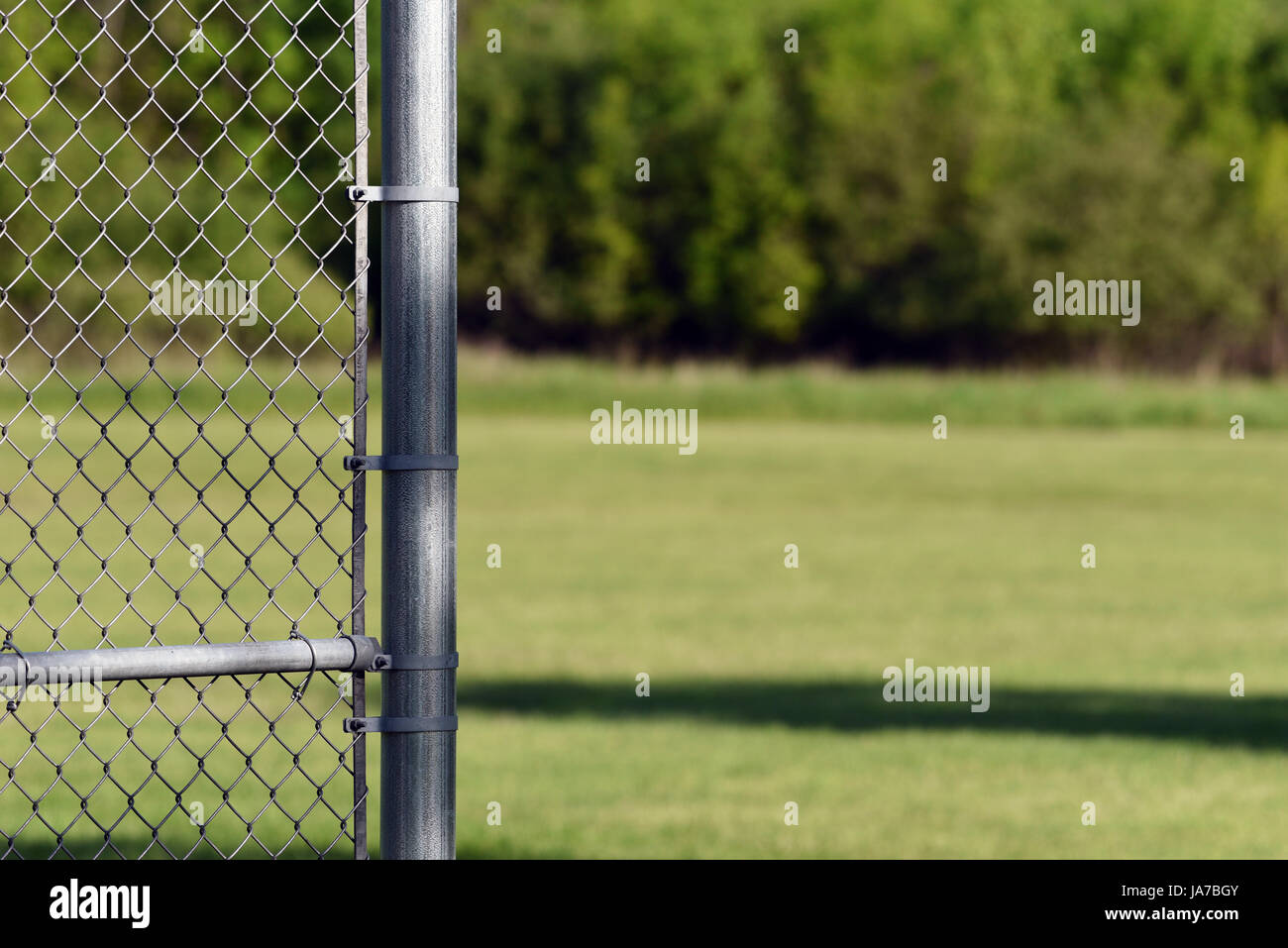 Fence on Baseball field Stock Photo - Alamy