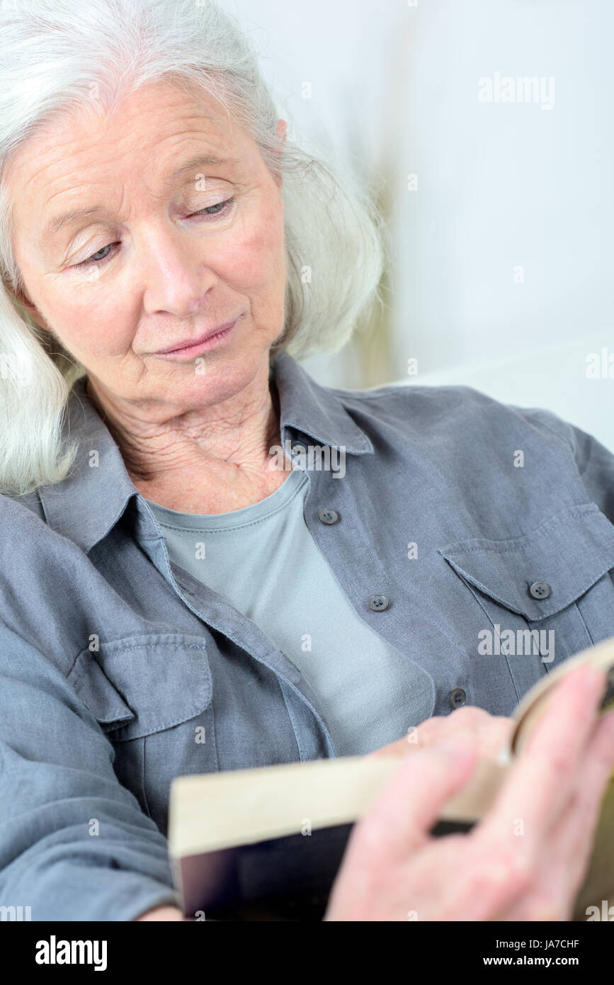Grandmother reading alone hi-res stock photography and images - Alamy