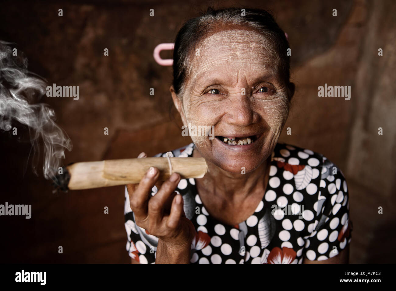 Woman smoking large cigar hi-res stock photography and images - Alamy