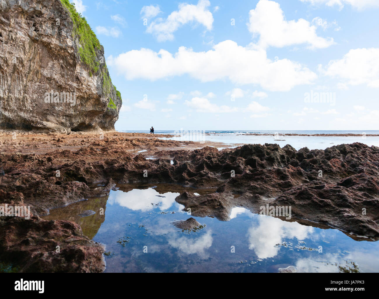 Child exploring rock pools hi-res stock photography and images - Alamy