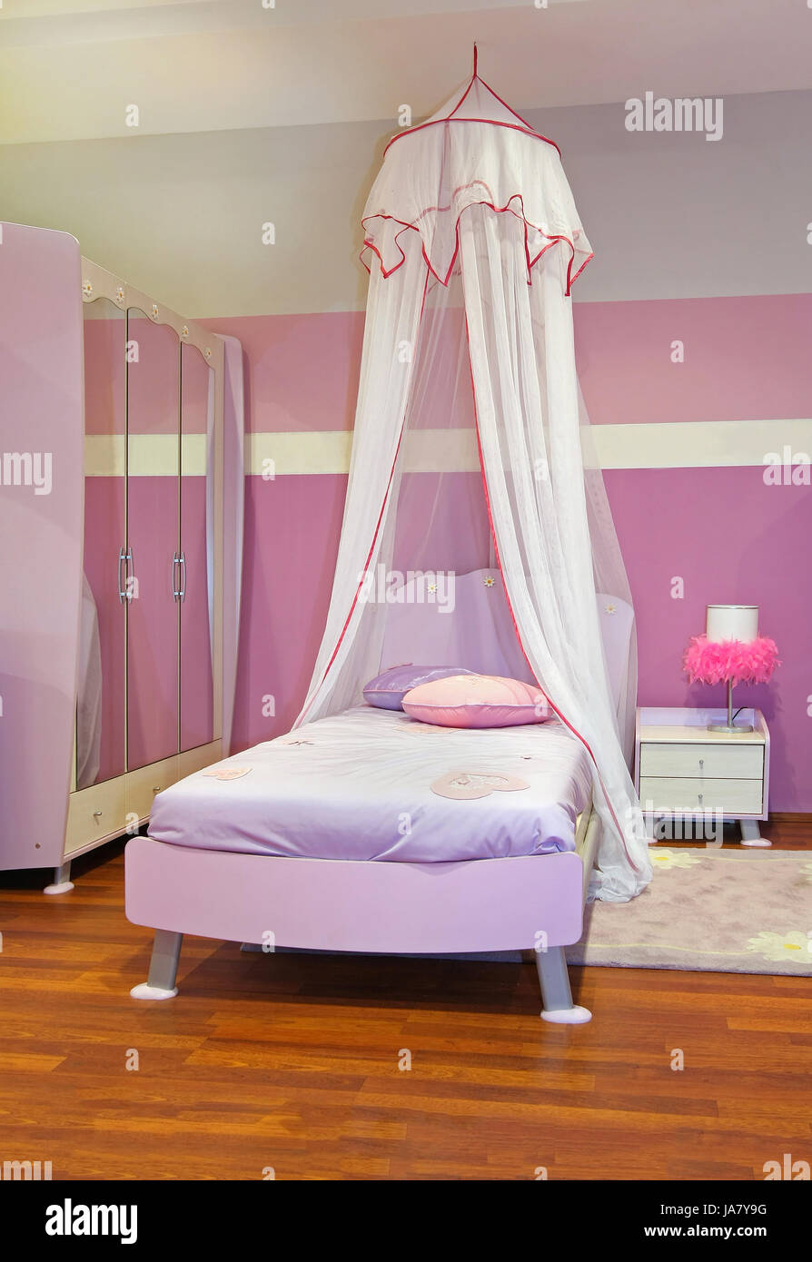 Modern girl bedroom interior with pink furniture Stock Photo - Alamy