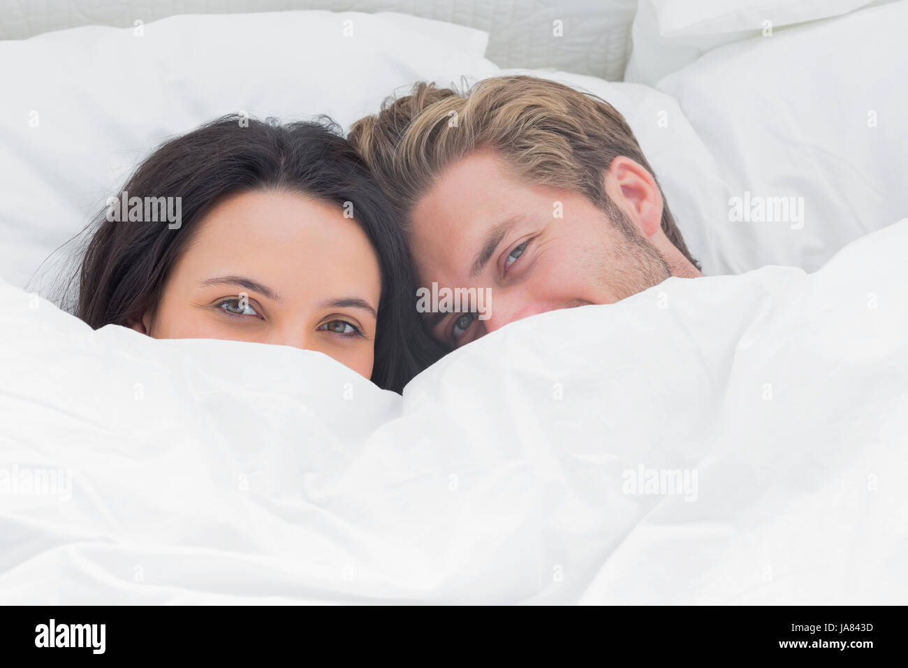 Hiding under bed man woman hi-res stock photography and images - Alamy