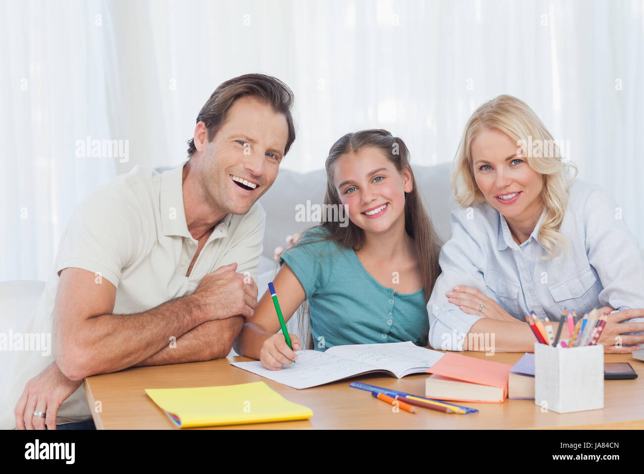 Father helping daughter homework in hi-res stock photography and images ...