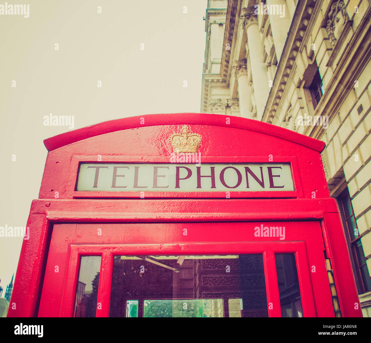 Vintage looking traditional red telephone hi-res stock photography and ...