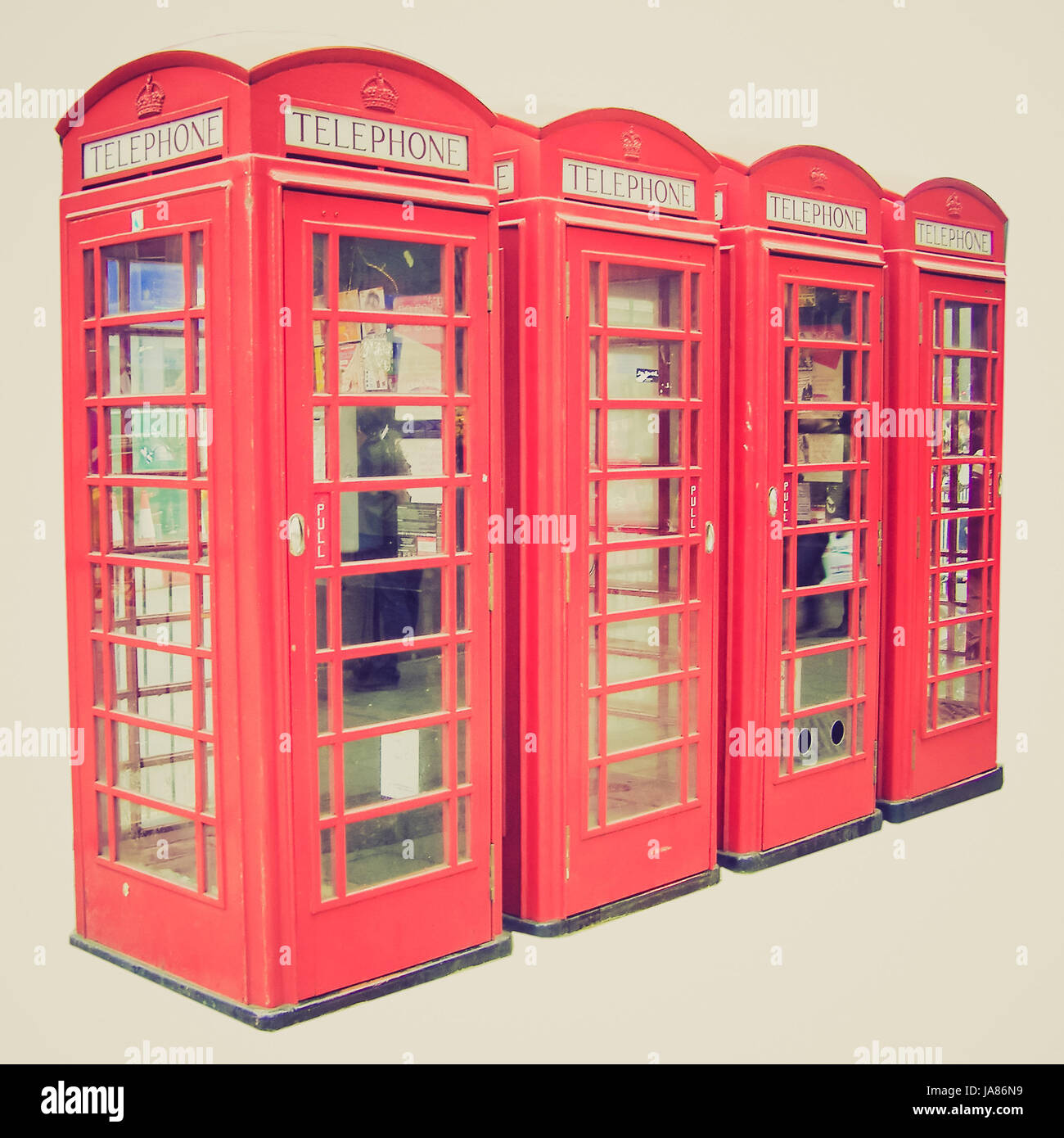 Vintage looking traditional red telephone hi-res stock photography and ...