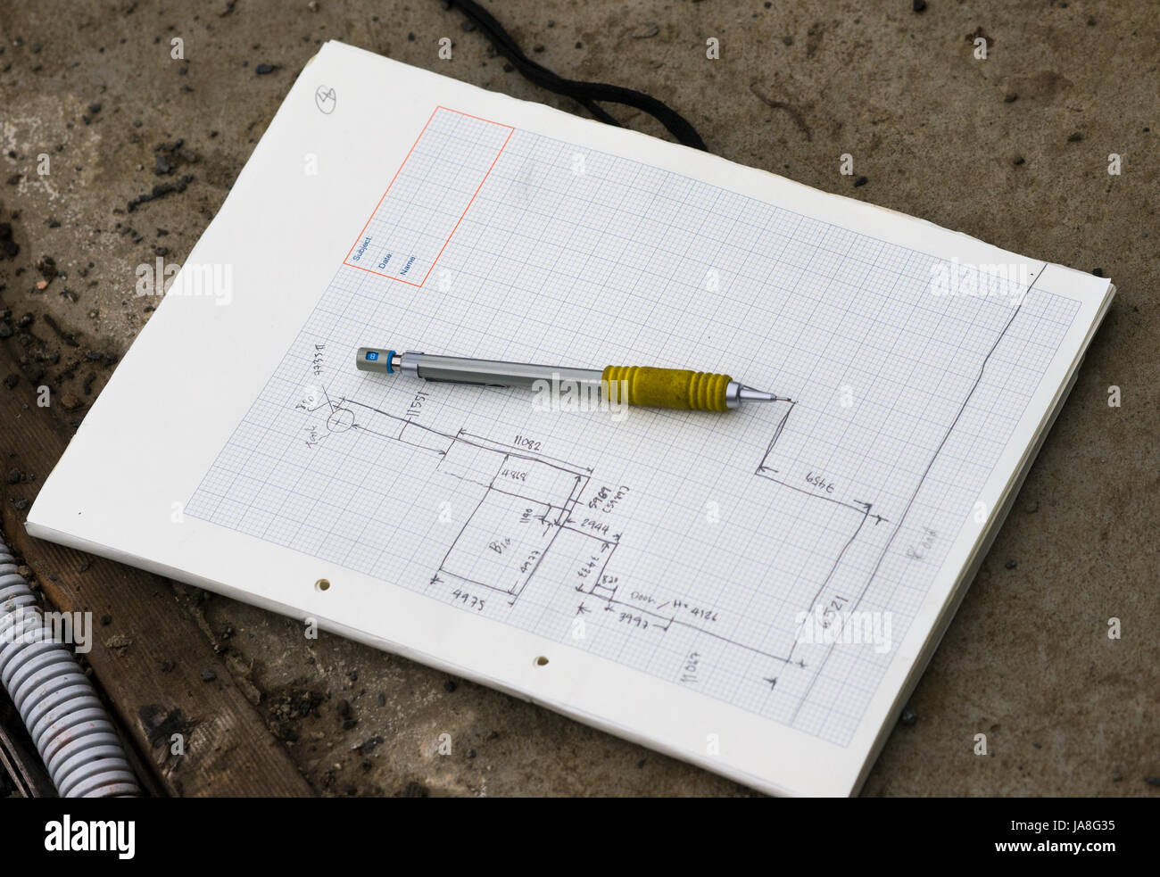 Hand drawn plan drawing in progress and a mechanical pencil at a ...