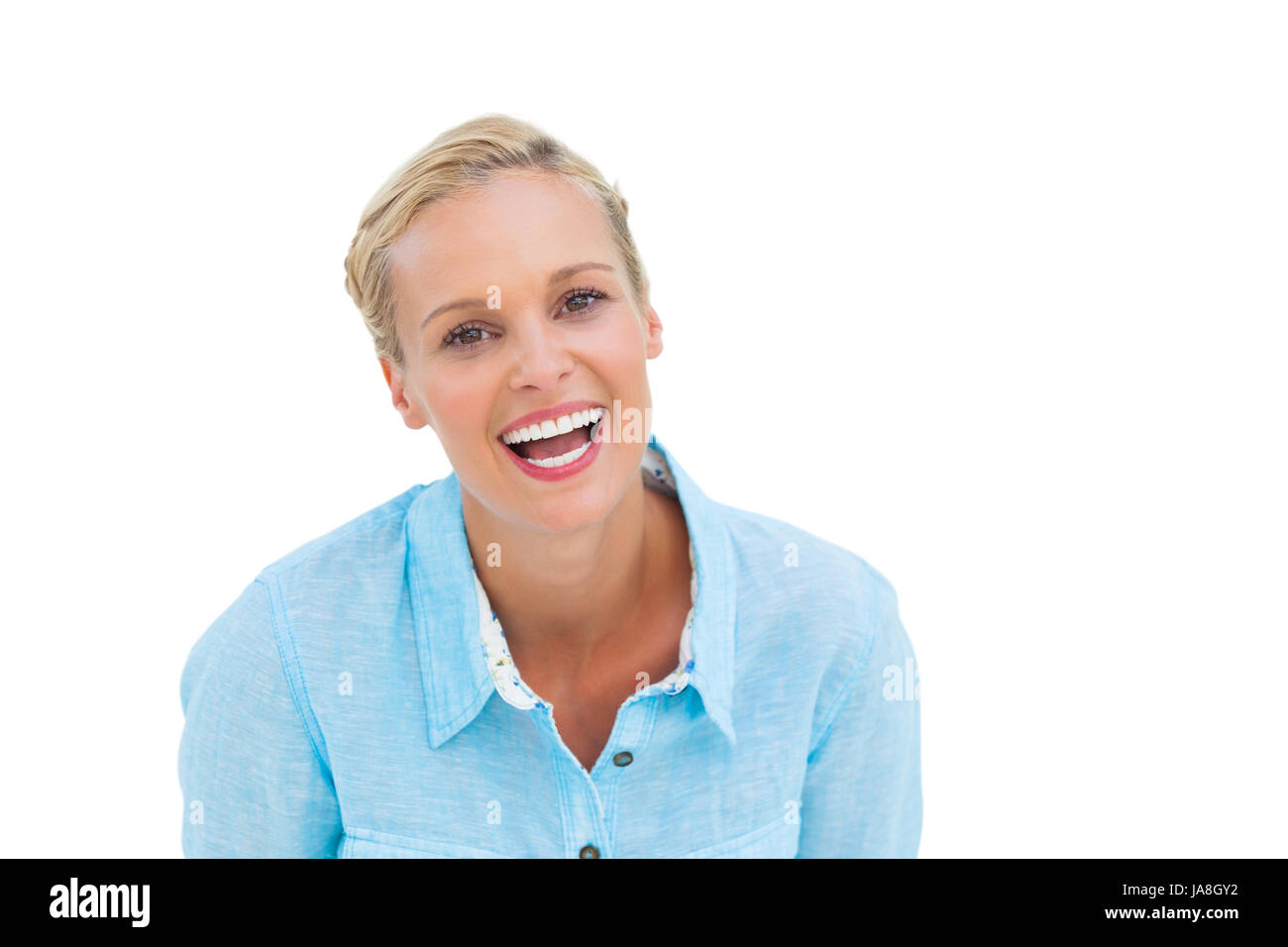 Pretty woman laughing at camera on white background Stock Photo - Alamy