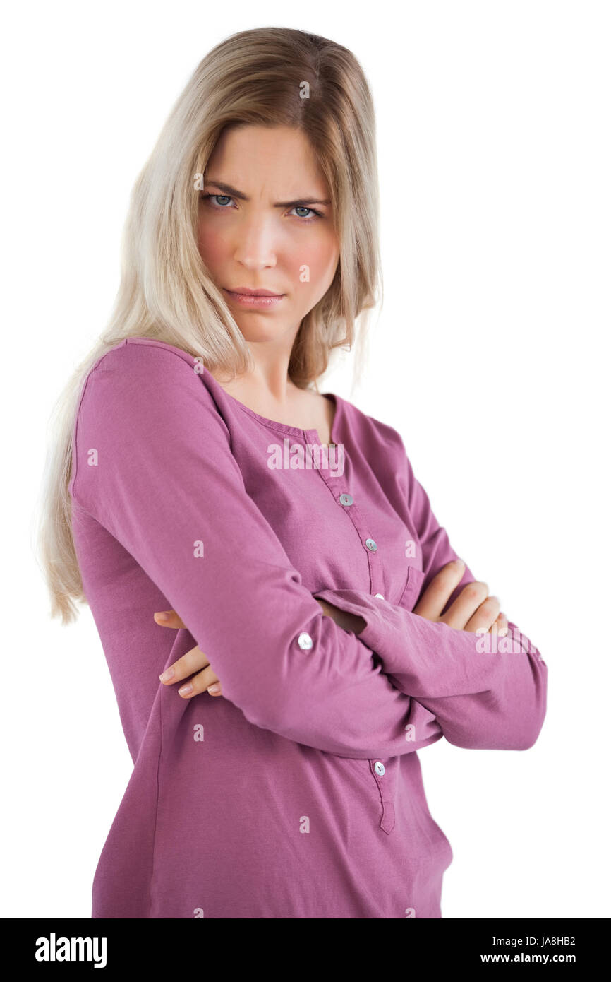 Mysterious woman with arms crossed on a white background Stock Photo ...