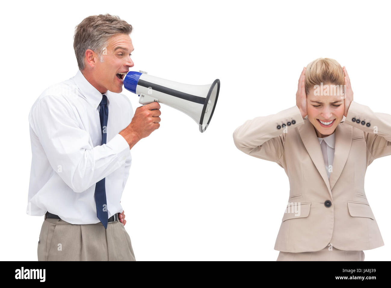 Mature businessman shouting at his coworker with megaphone on white ...