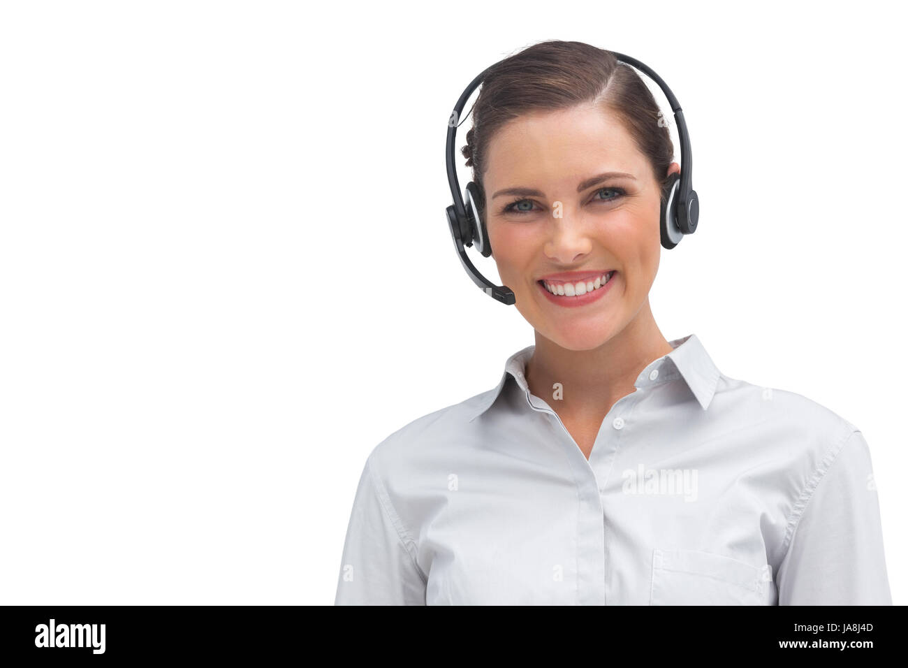Smiling call centre agent with headset on a white background Stock ...