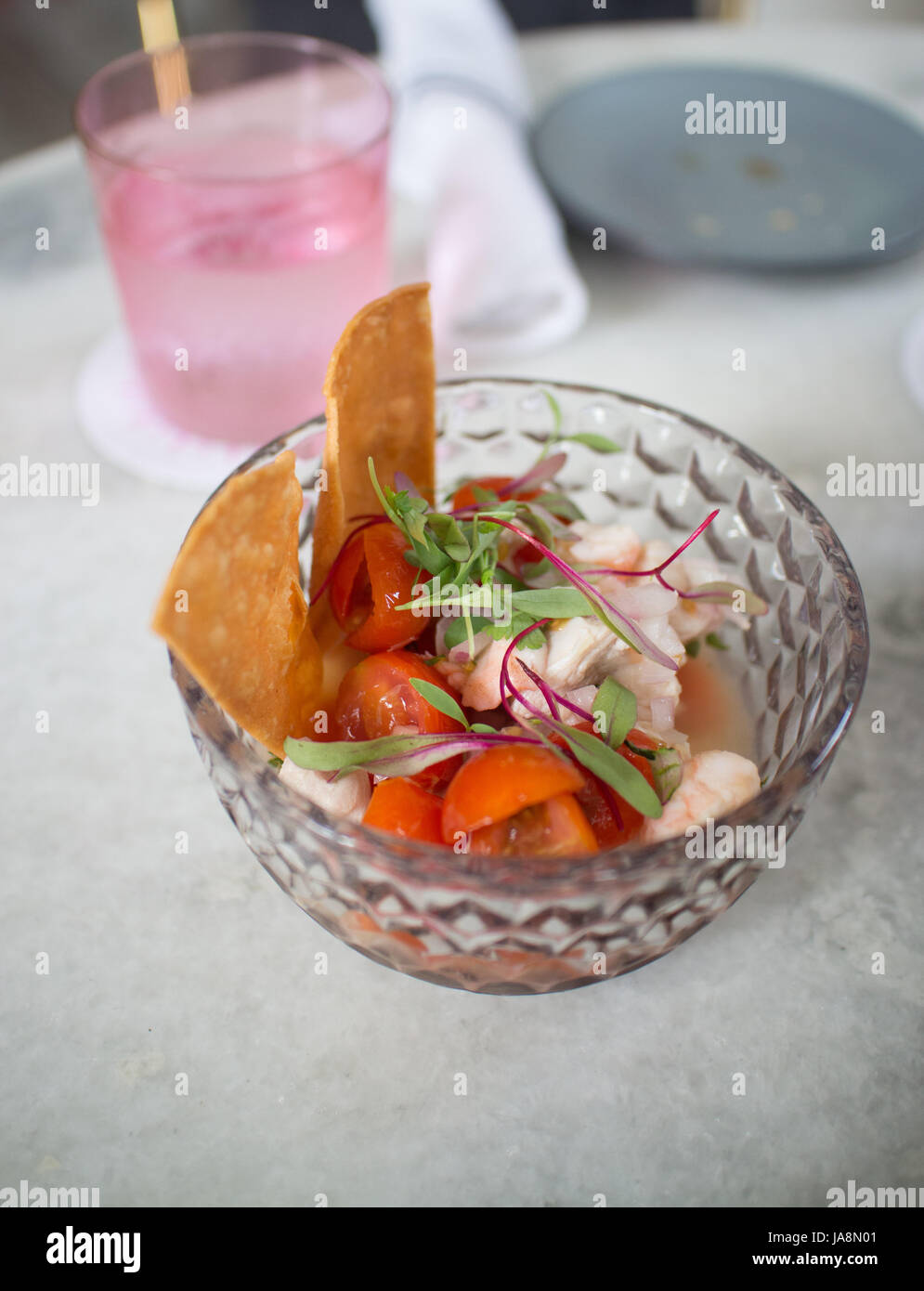 Mexican-style ceviche in a glass bowl Stock Photo - Alamy
