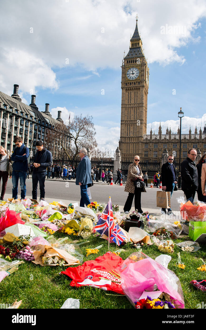 Floral tributes outside Parliament Square, to the victims of the ...