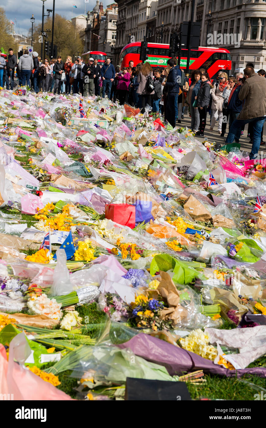 Floral tributes outside Parliament Square, to the victims of the ...