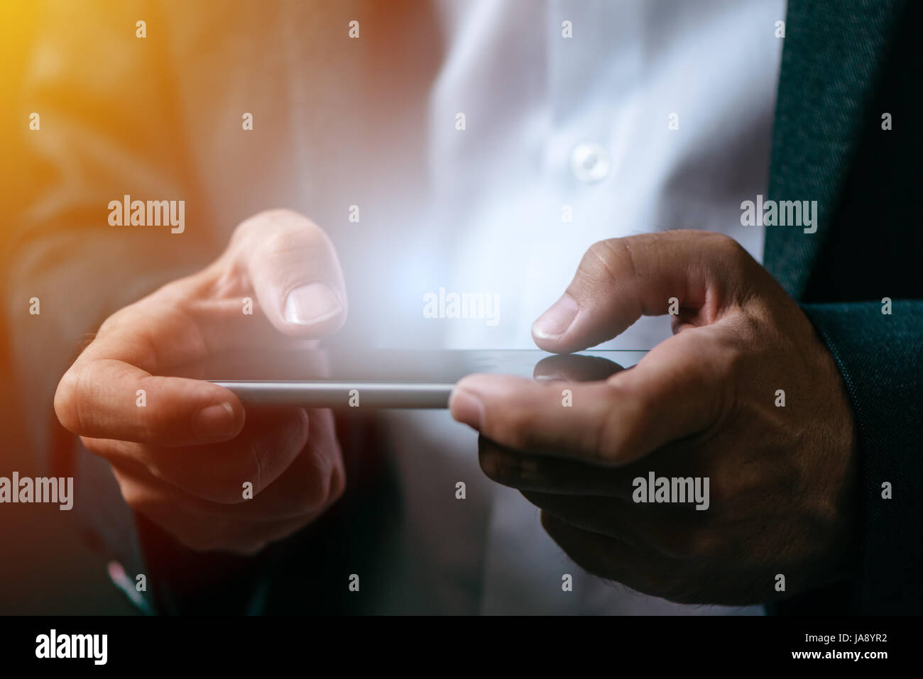 Male businessman gamer playing mobile hi-res stock photography and ...