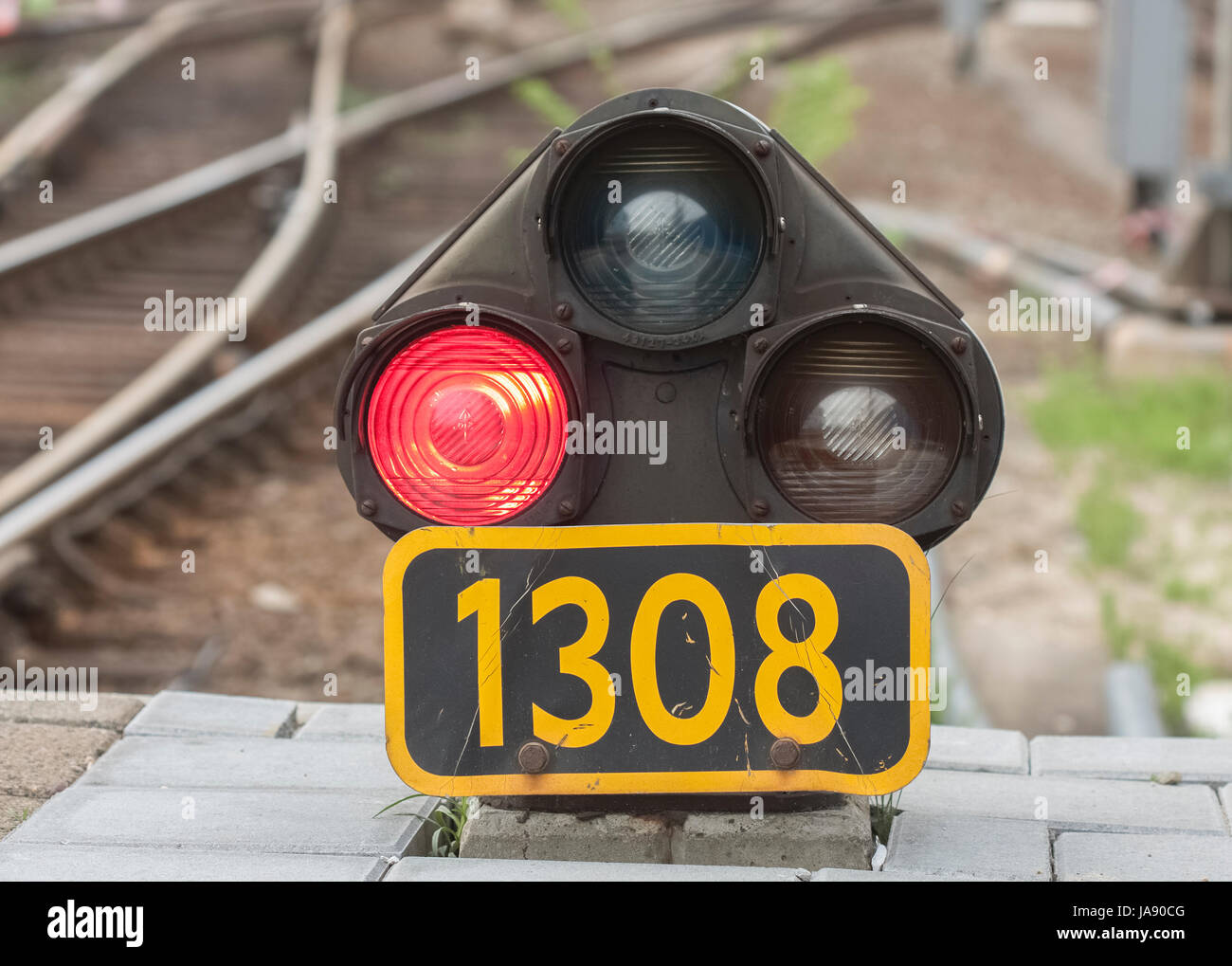 Traffic light shows red signal on railway. Red light Stock Photo - Alamy