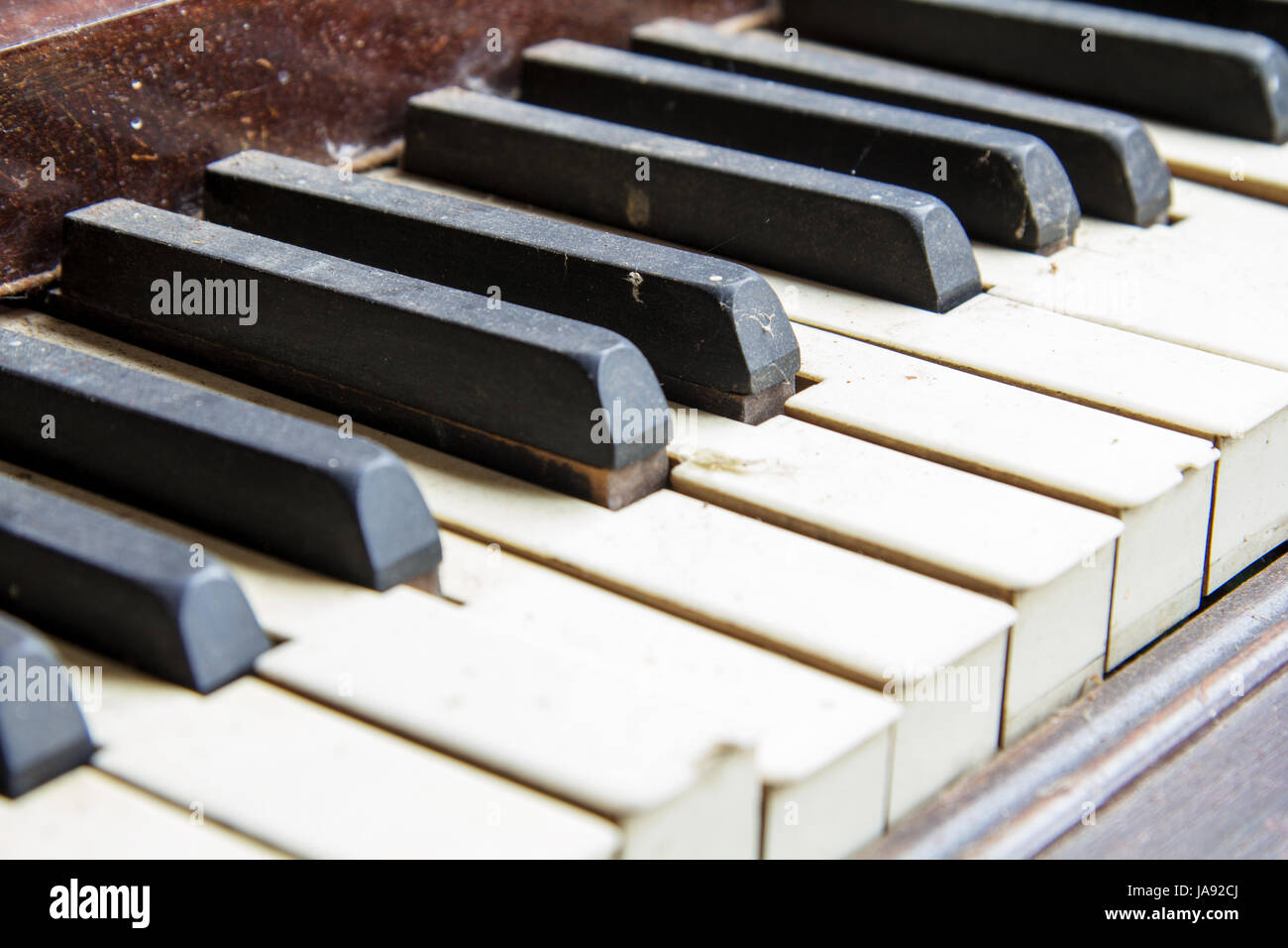 Keys from an old broken and damaged piano Stock Photo - Alamy