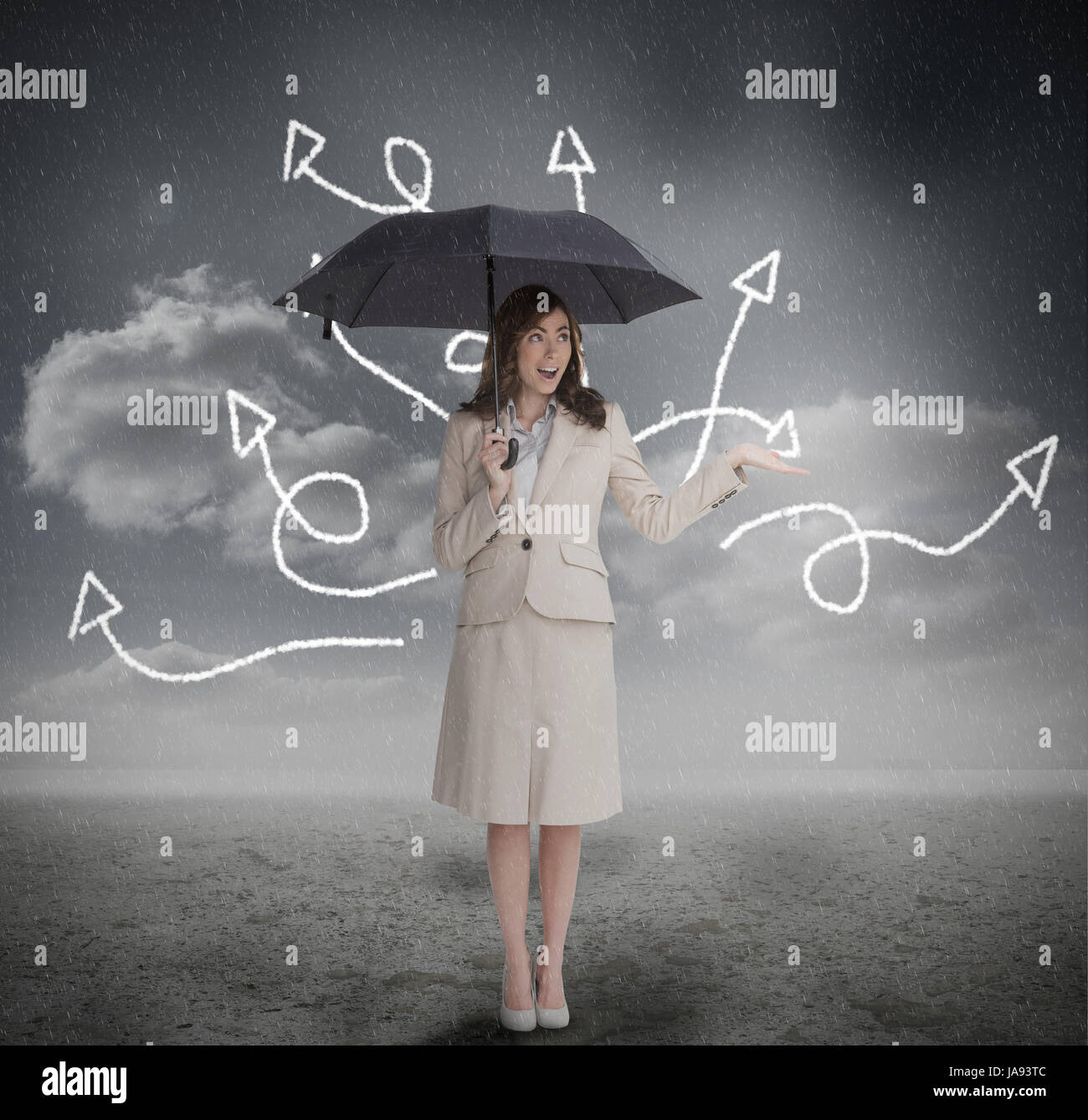Businesswoman with jumbled arrows holding umbrella and smiling in dark ...