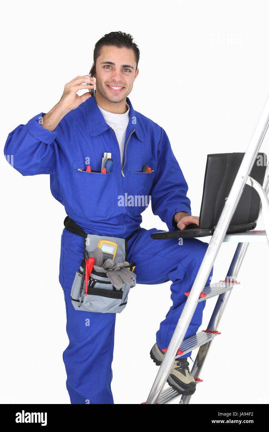 Electrician posing with his building materials and tools Stock Photo ...