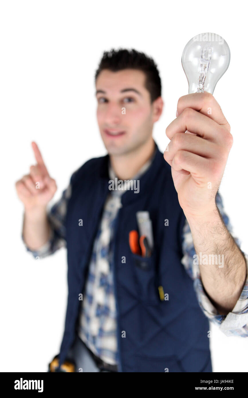 Man holding a light bulb Stock Photo - Alamy