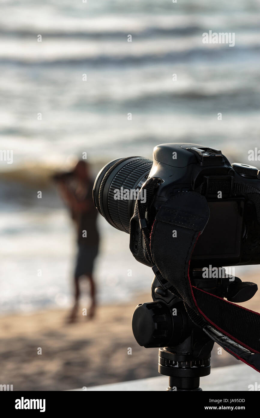 Camera on a tripod to take pictures of the sea Stock Photo - Alamy