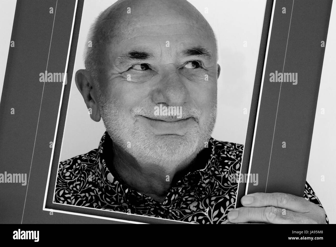 Old man in a picture frame in black and white Stock Photo - Alamy