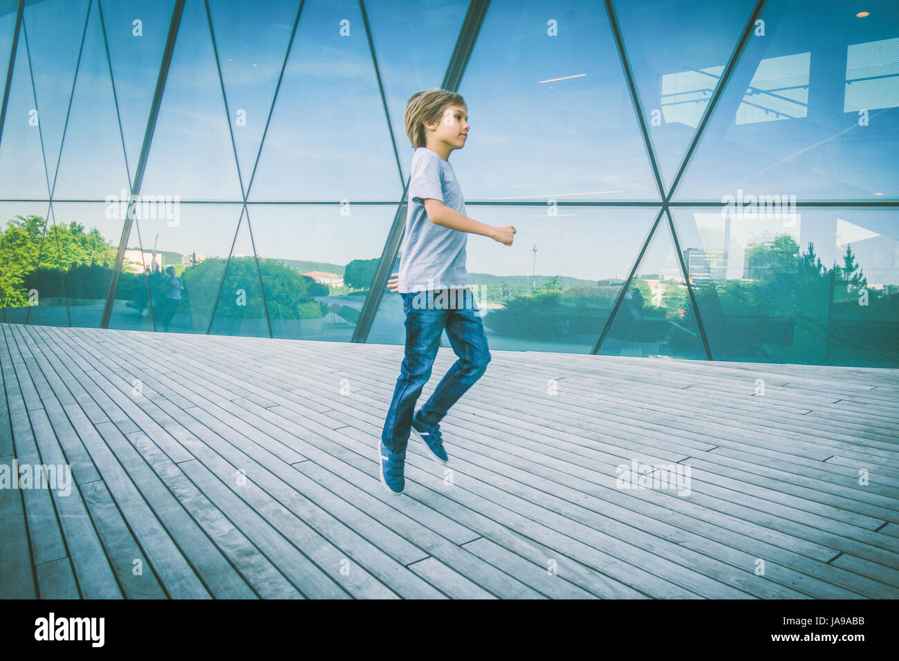 Male action teen running hi-res stock photography and images - Alamy