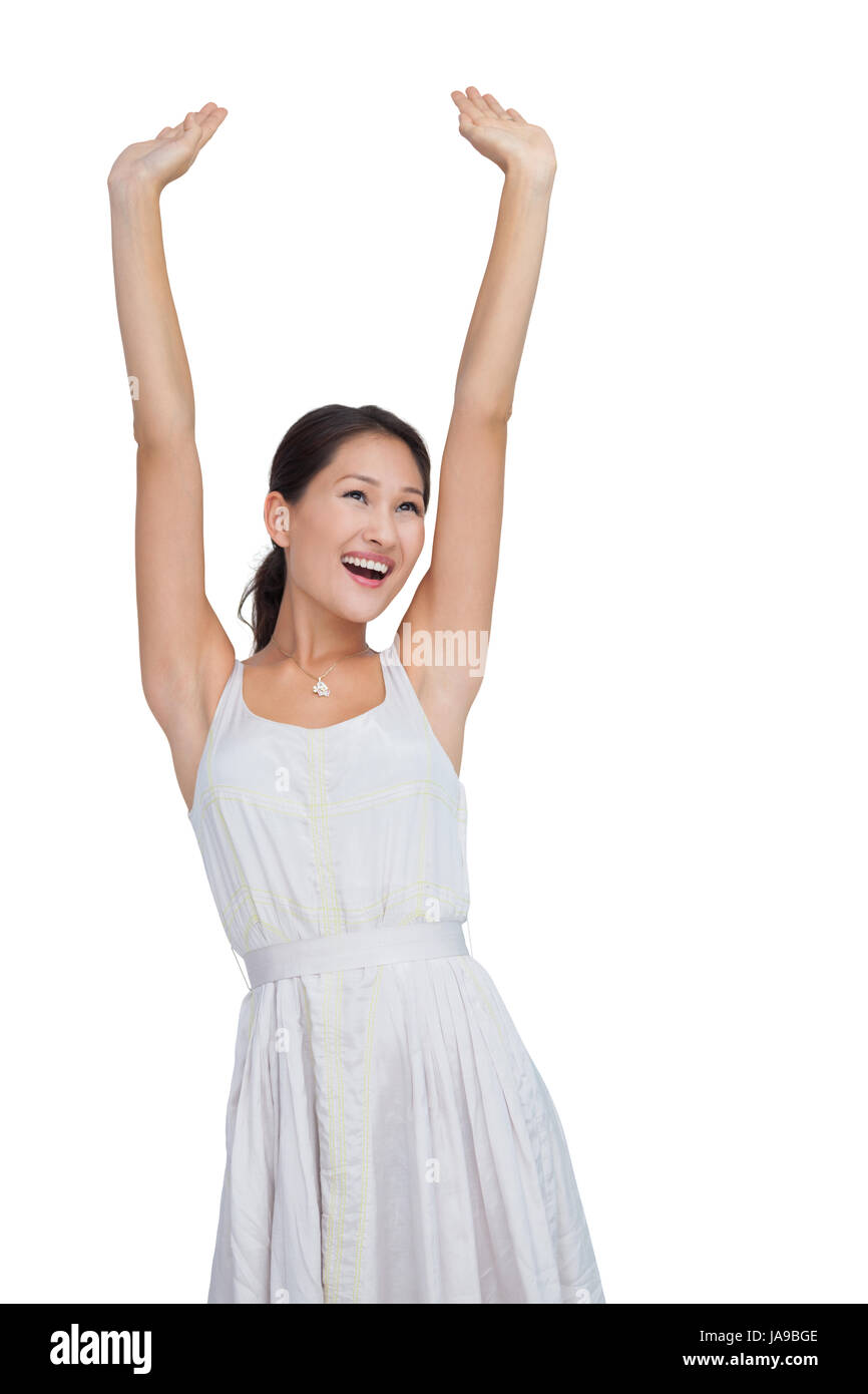 Beautiful woman cheering on white background Stock Photo - Alamy