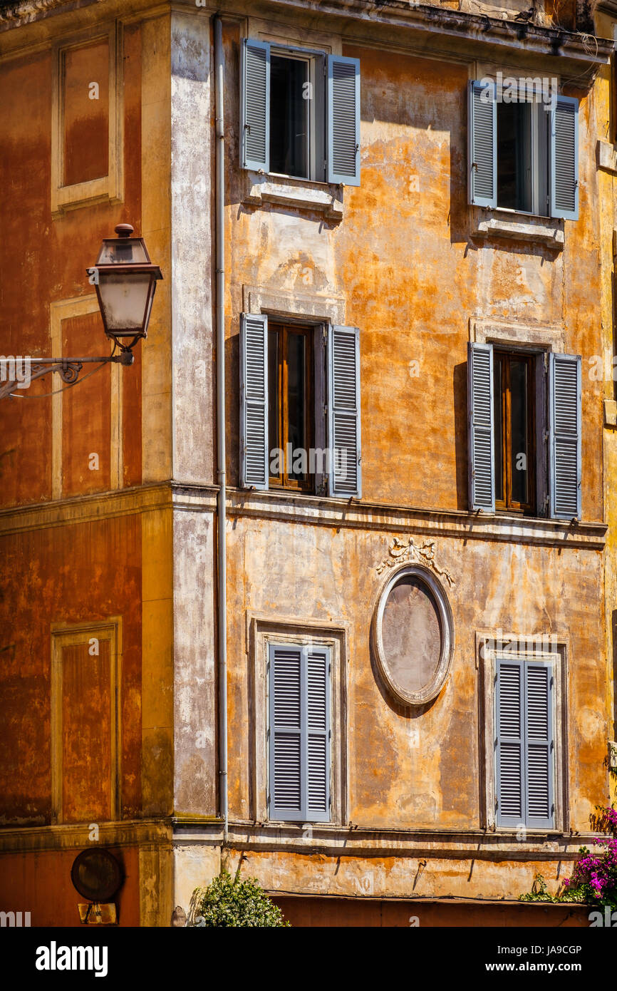 Old colorful facade walls and windows, grunge architectural background ...