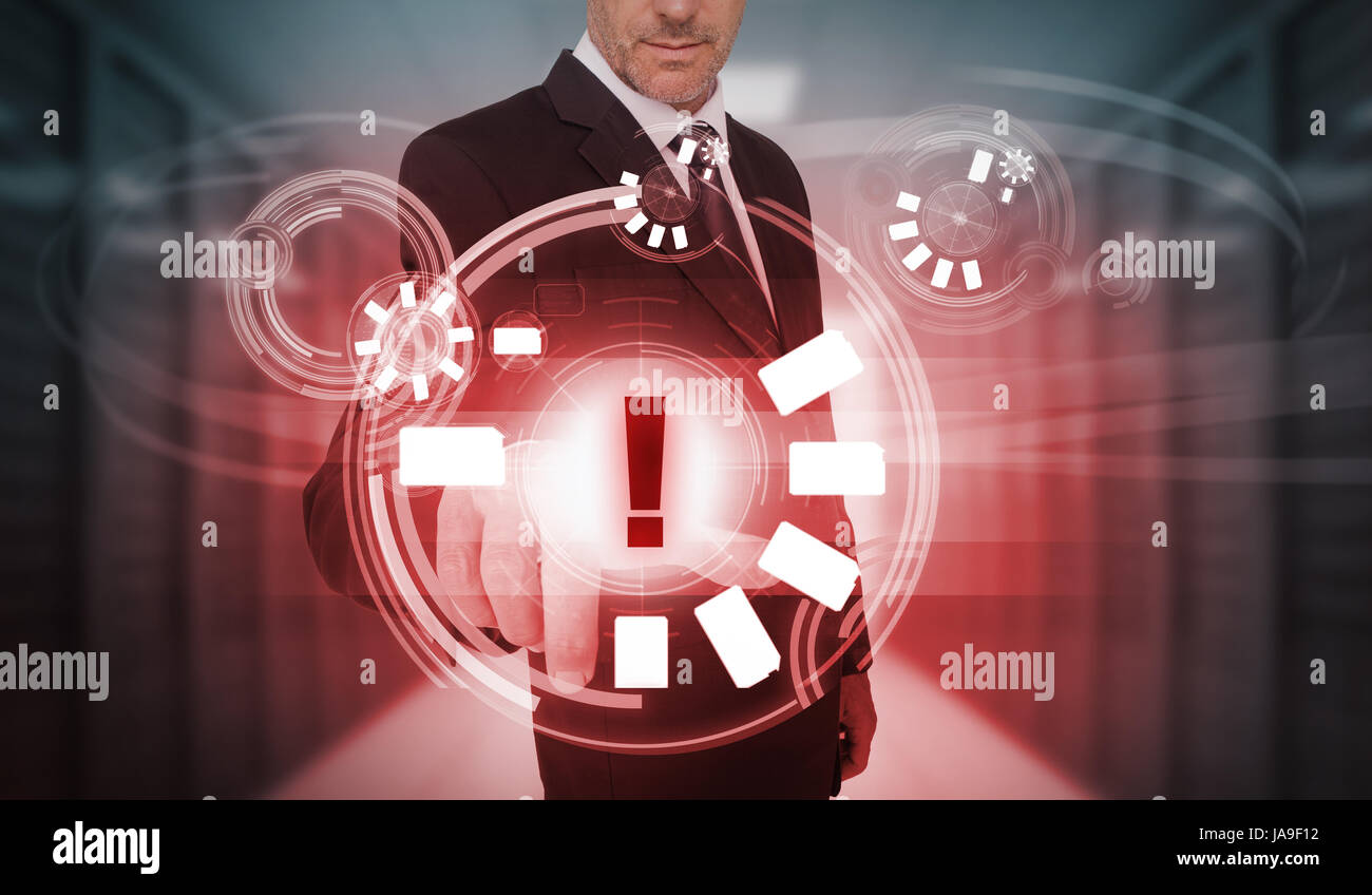 Businessman touching red futuristic warning icon interface in data ...