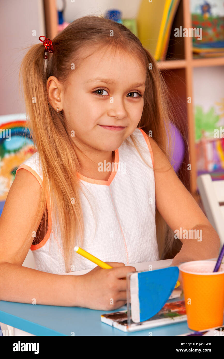 Small students children painting in art school class Stock Photo - Alamy