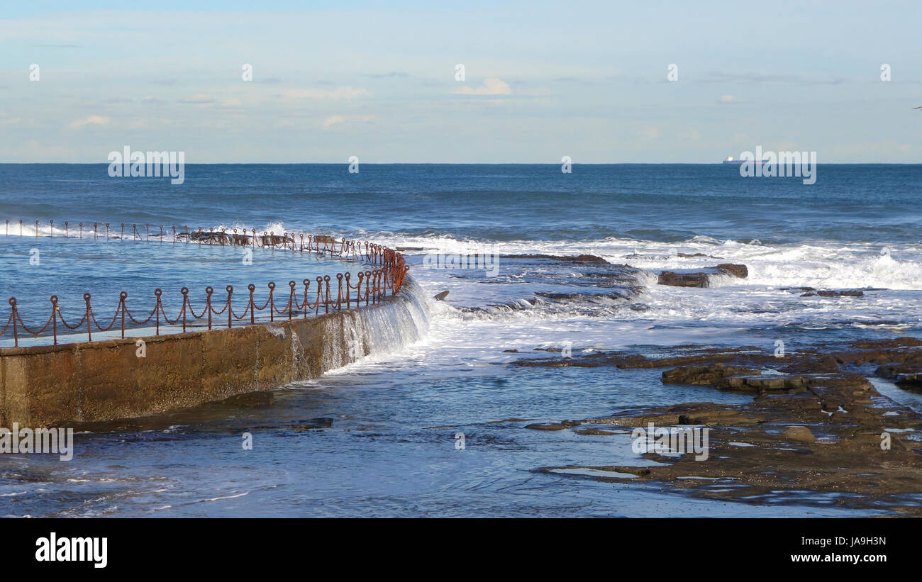 Old rusty bollards at Newcastle beach, Australia Stock Photo - Alamy