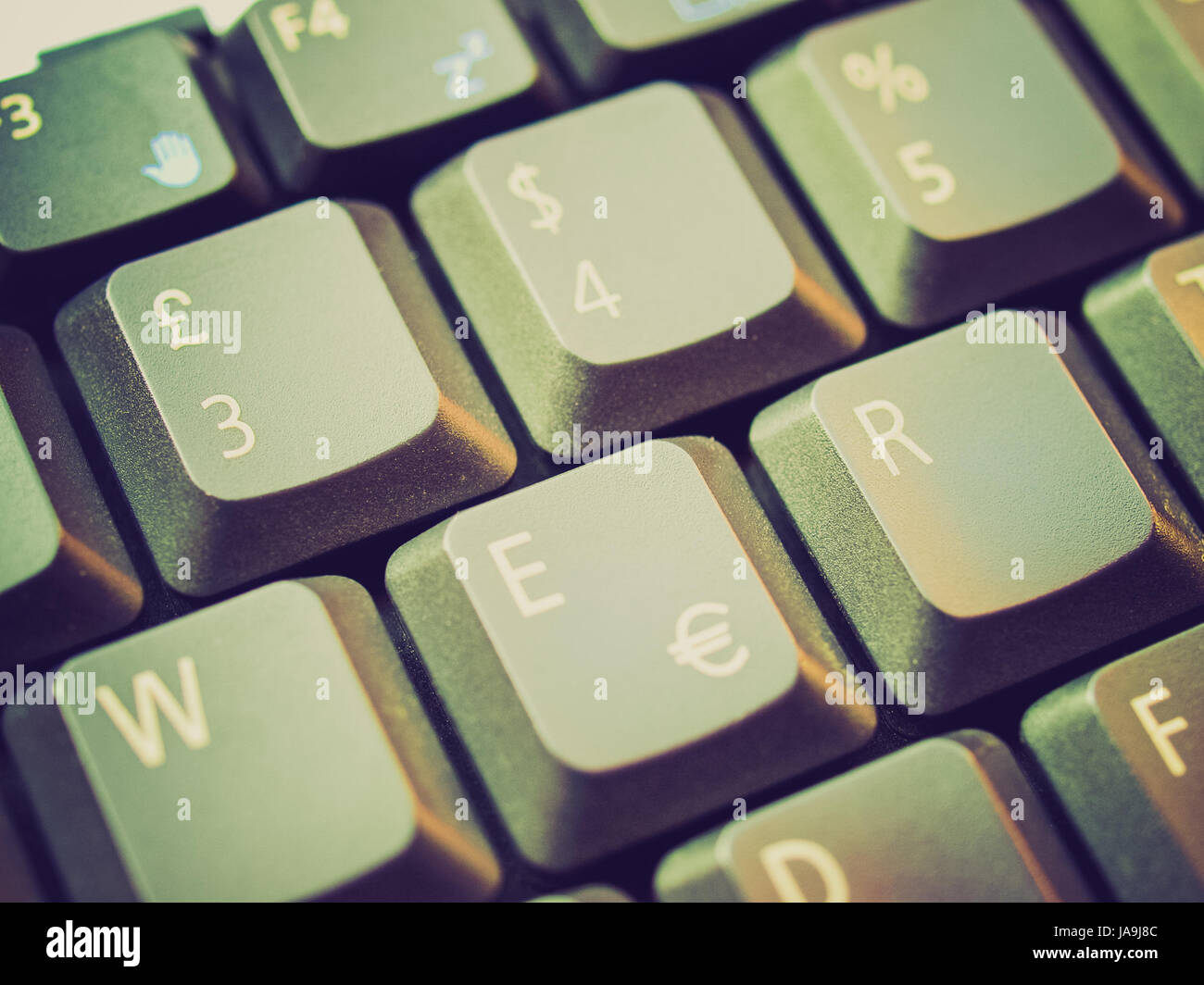 Vintage looking Detail of keys on a computer keyboard Stock Photo - Alamy