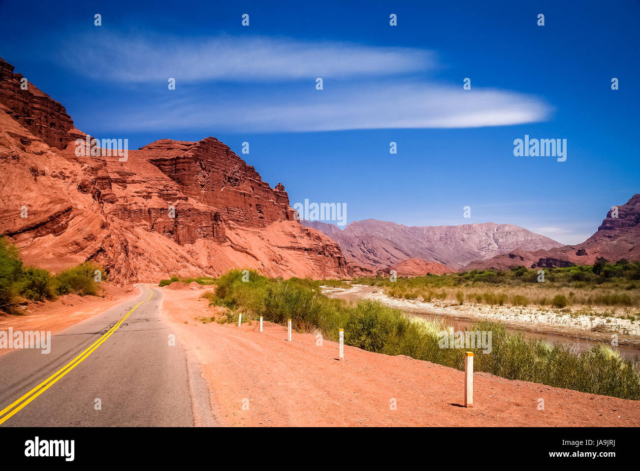 Road through colourful polychromic mountains in Northern Argentina ...