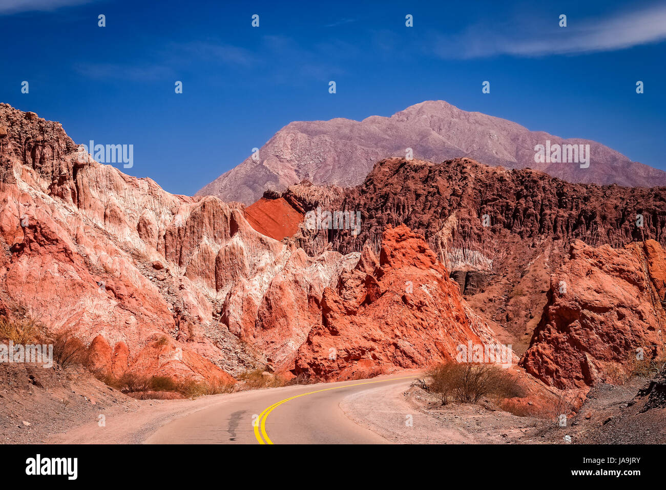 Road through colourful polychromic mountains in Northern Argentina ...