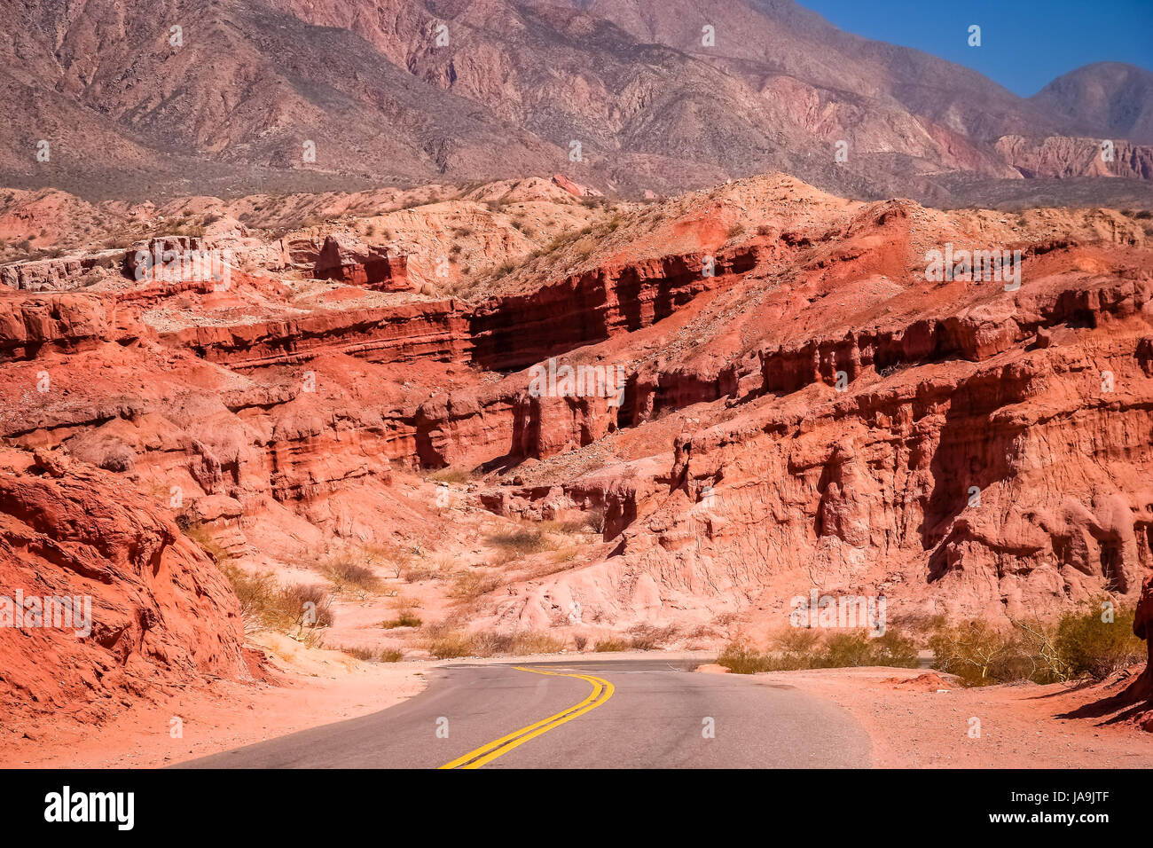 Road through colourful polychromic mountains in Northern Argentina ...