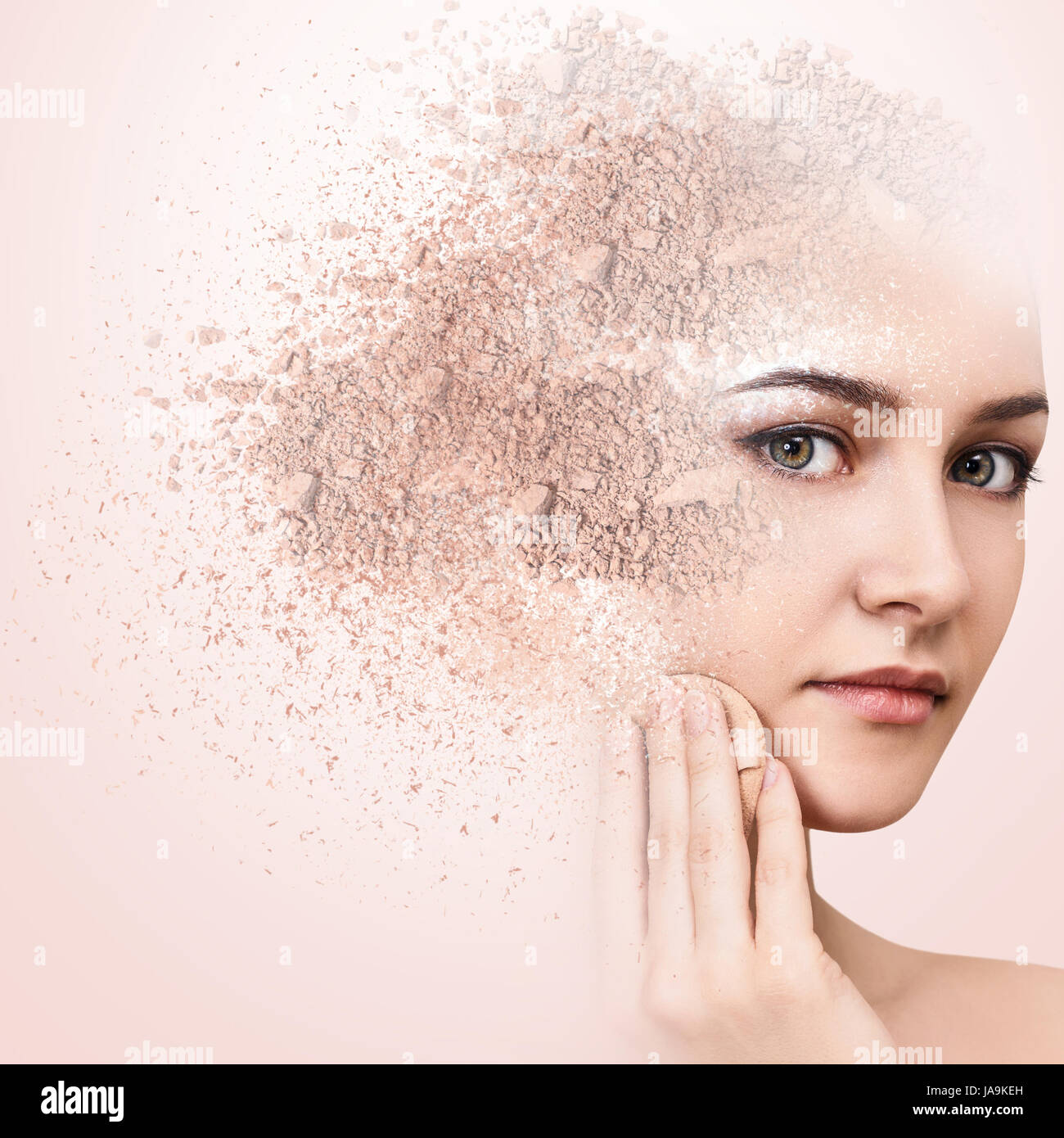 Woman face made from crumbly powder over beige background Stock Photo ...