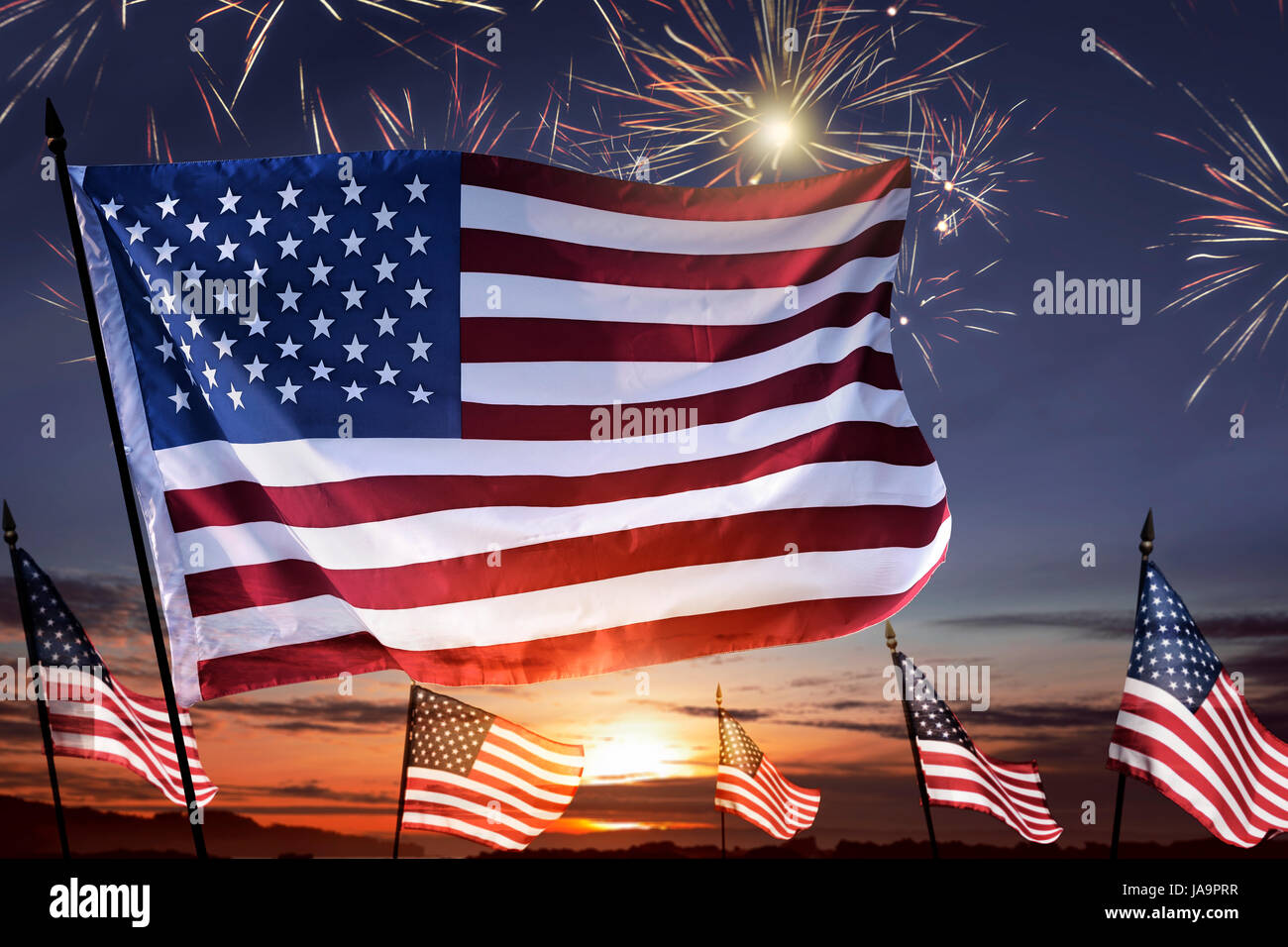 American flag on the sky waving celebrating 4th of July with fireworks ...