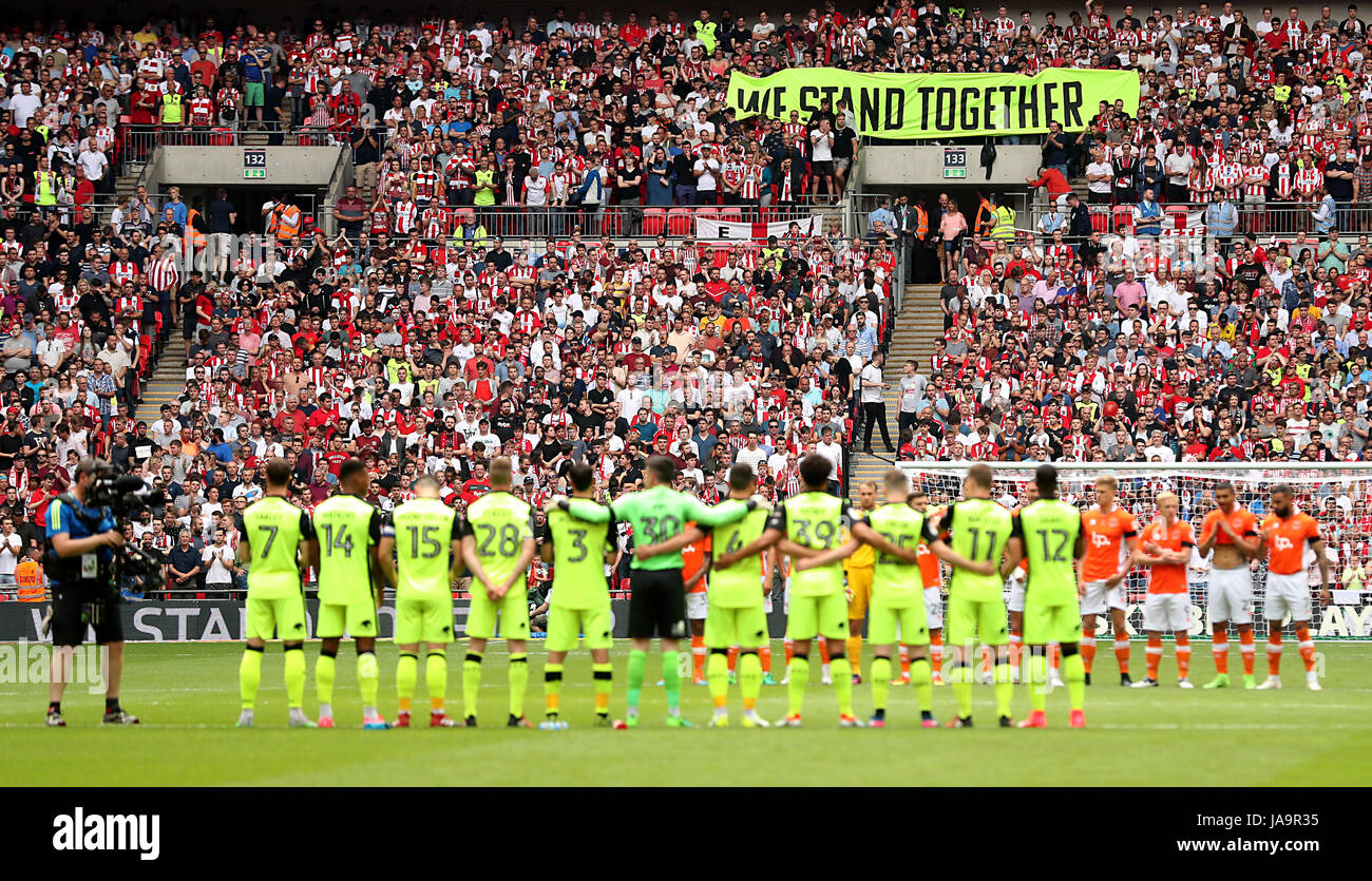 Teams line up prior to the match Stock Photo - Alamy