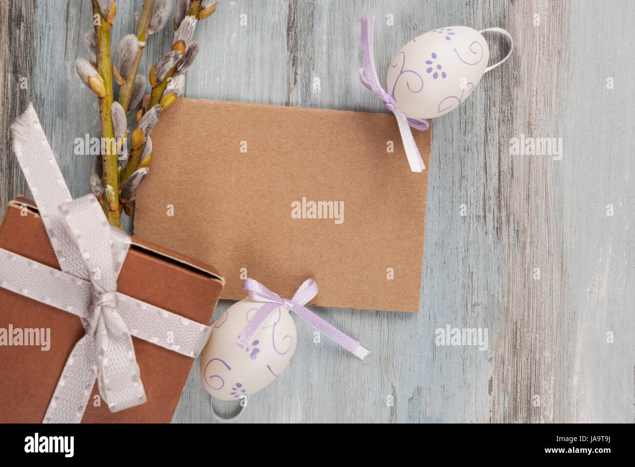 Traditional easter background with gift box with ribbon from above on ...