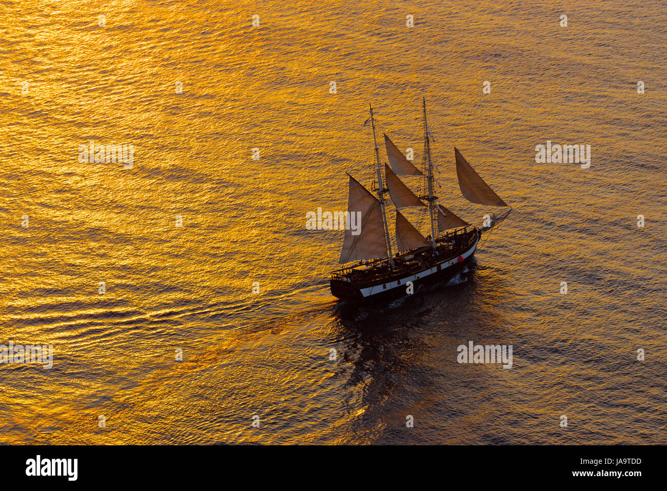 sailboat at sunset Stock Photo - Alamy