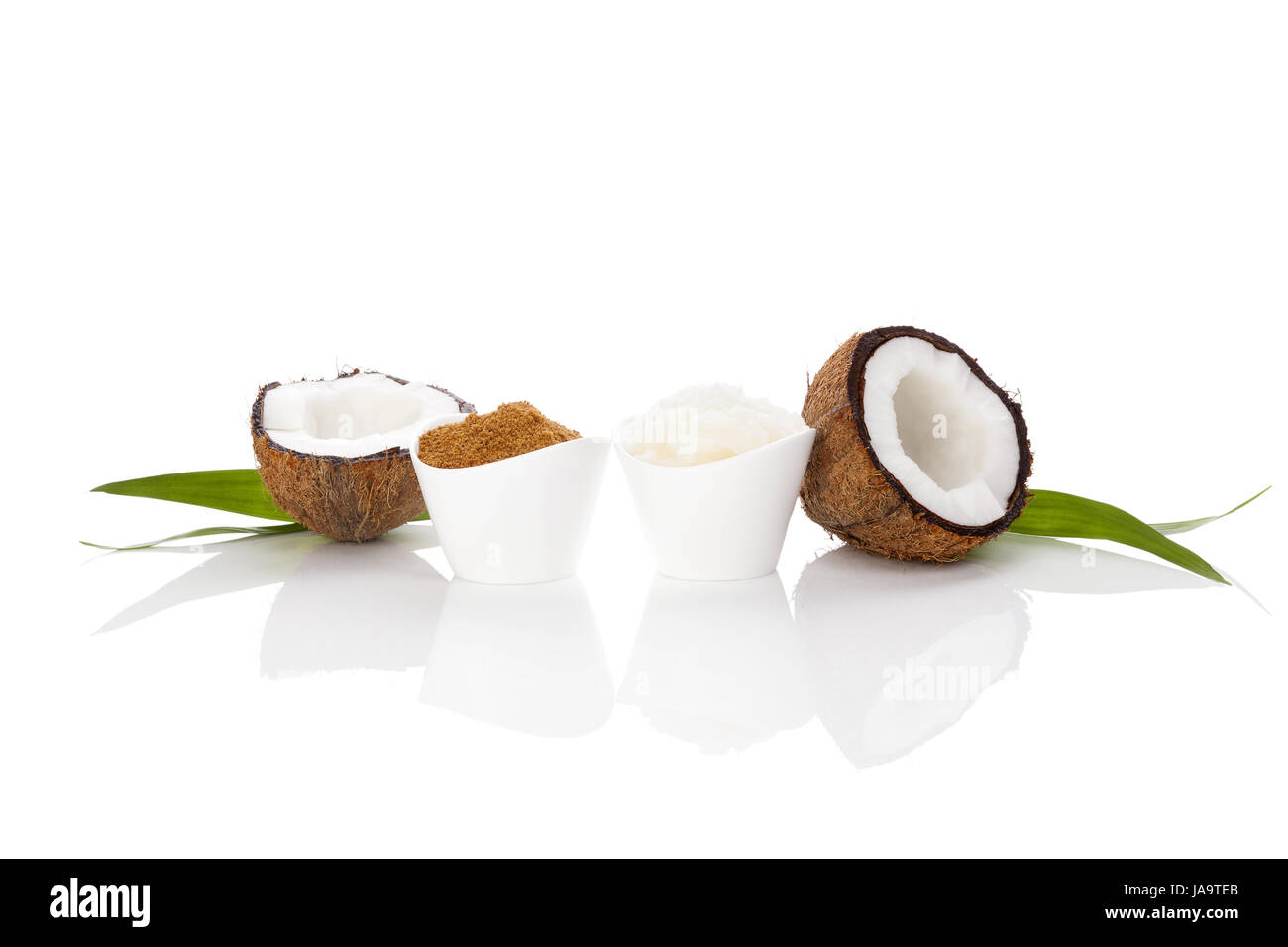 Coconut sugar and hard coconut oil isolated white background. Coconut ...