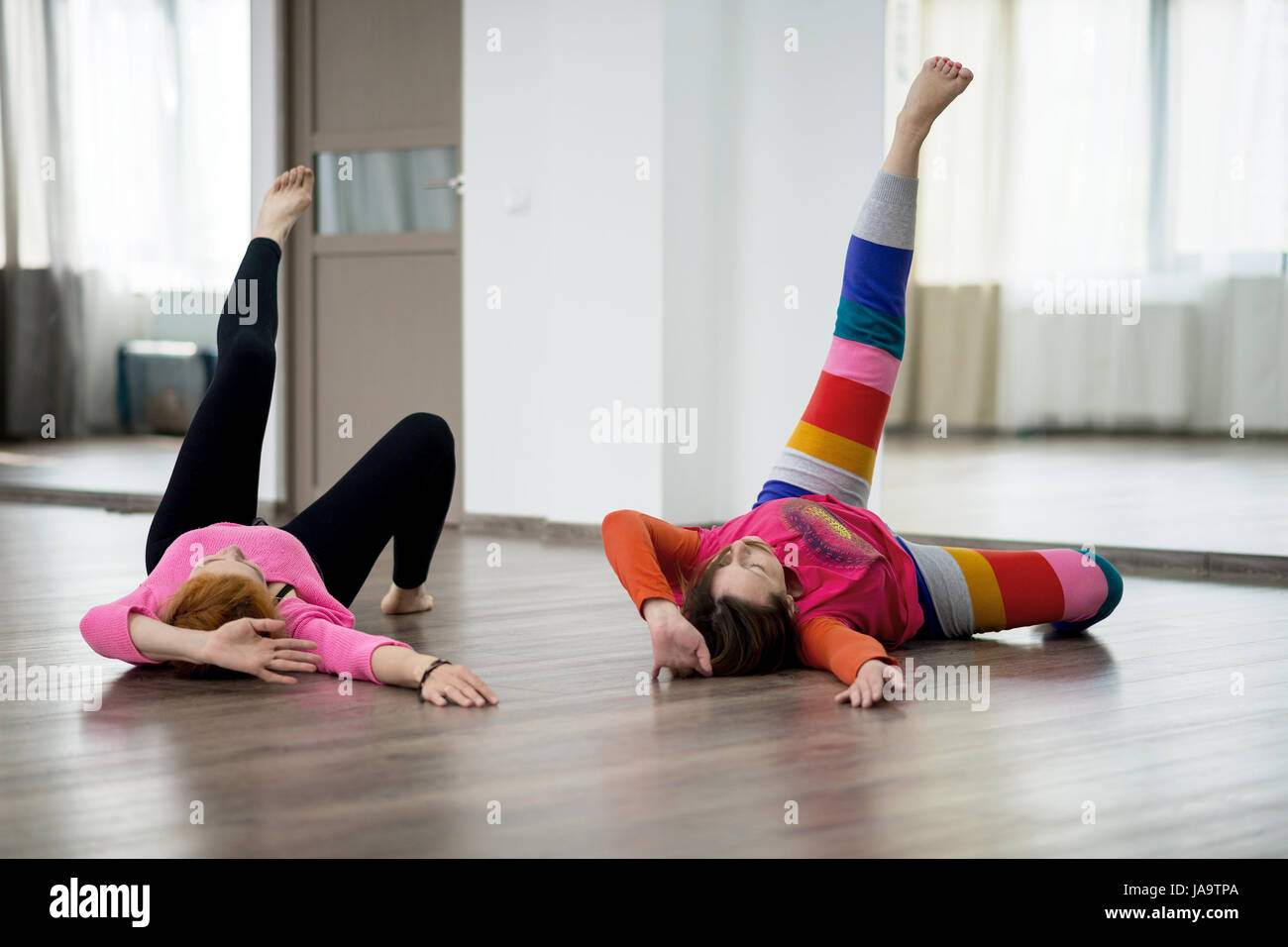 Two women dancing dance contact improvisation Stock Photo - Alamy