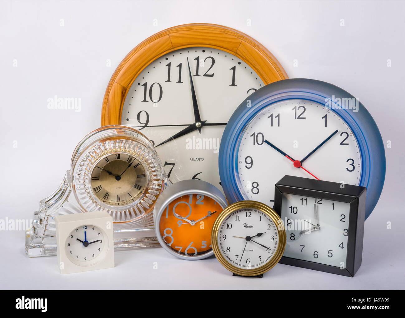 Group of watches of different shapes, sizes and colors with different ...