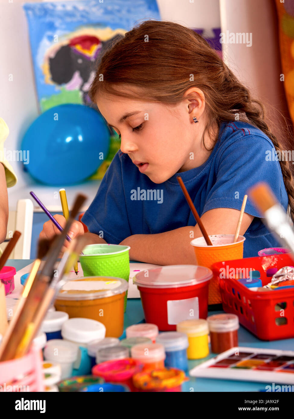 Small students children painting in art school class Stock Photo - Alamy
